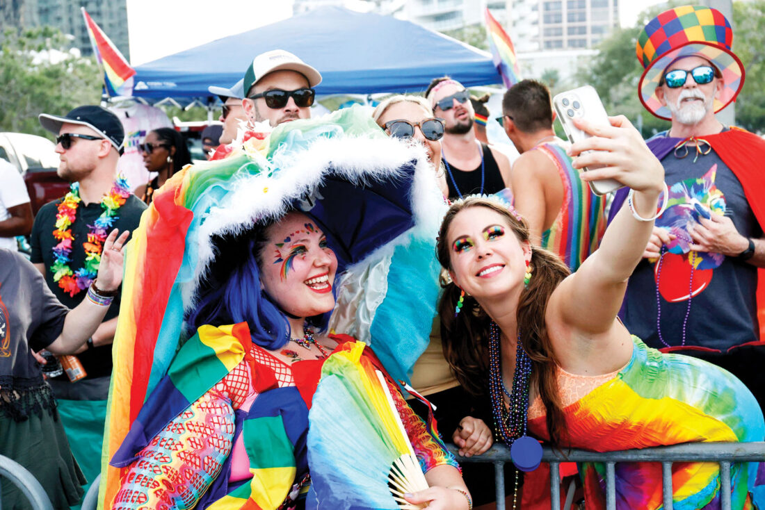 Out and About It: LGBTQ+ Pride revelers flash feathers, flags from New ...